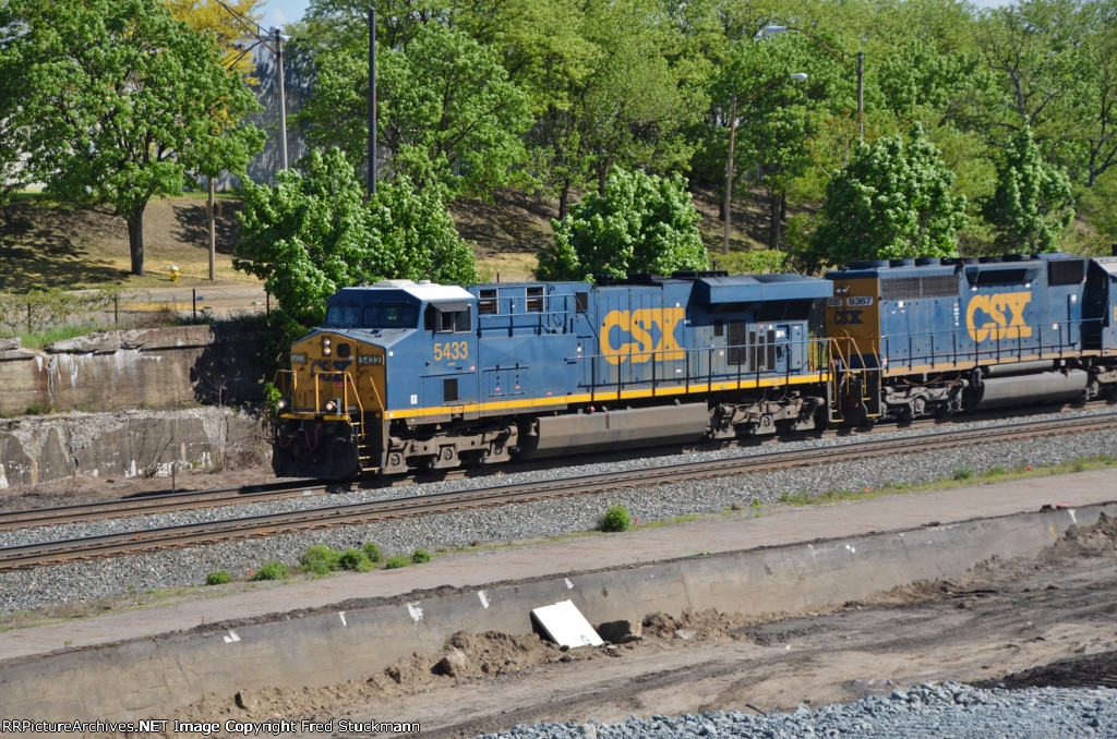 CSX 5433 deals with a stiff west wind.